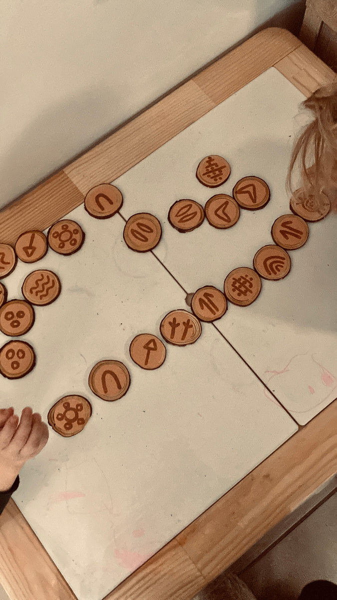 1. Wooden Symbol Disc Game – Barka Arts